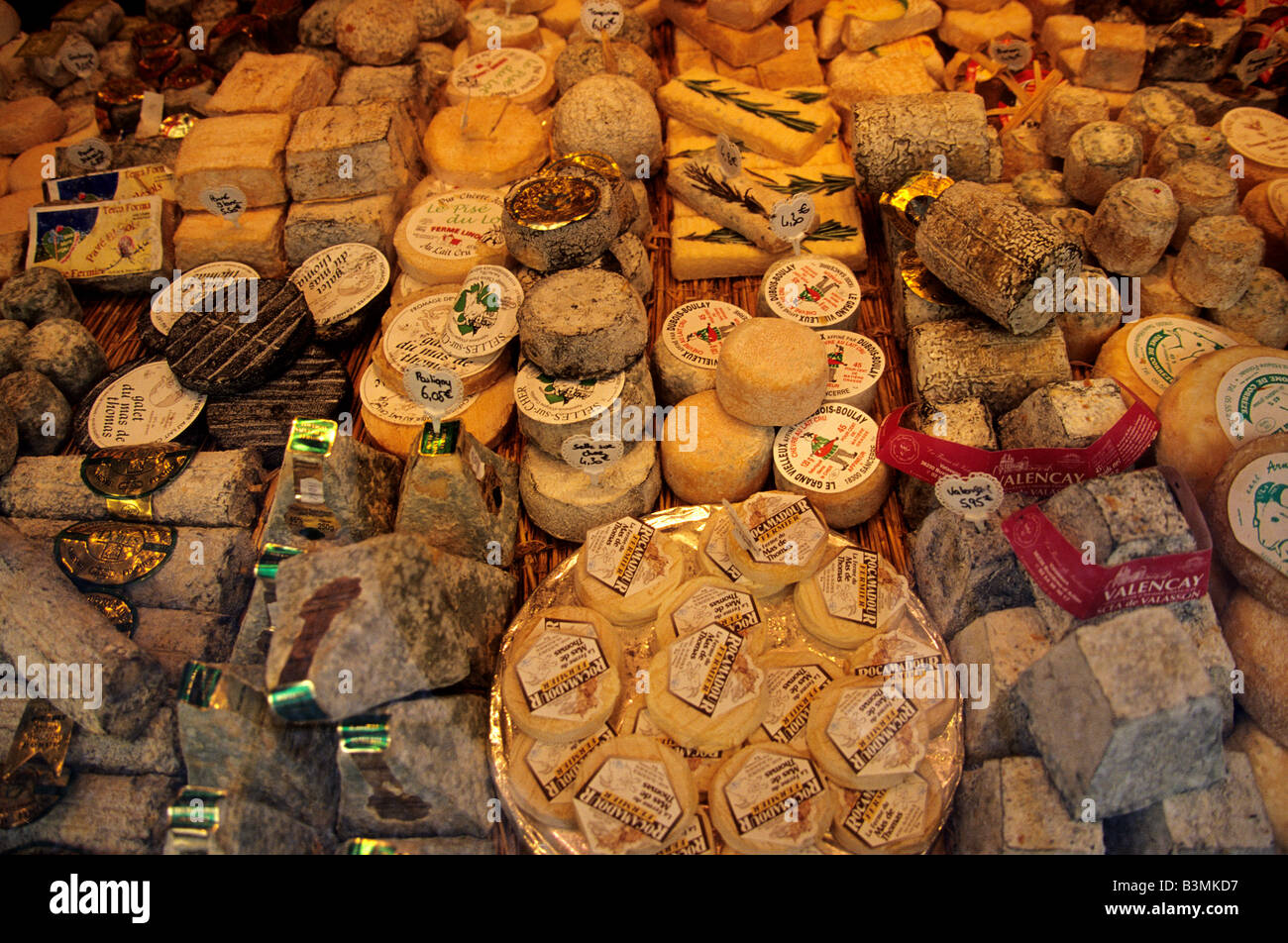 France Paris Cheese on display in a shop window in Paris Stock Photo ...