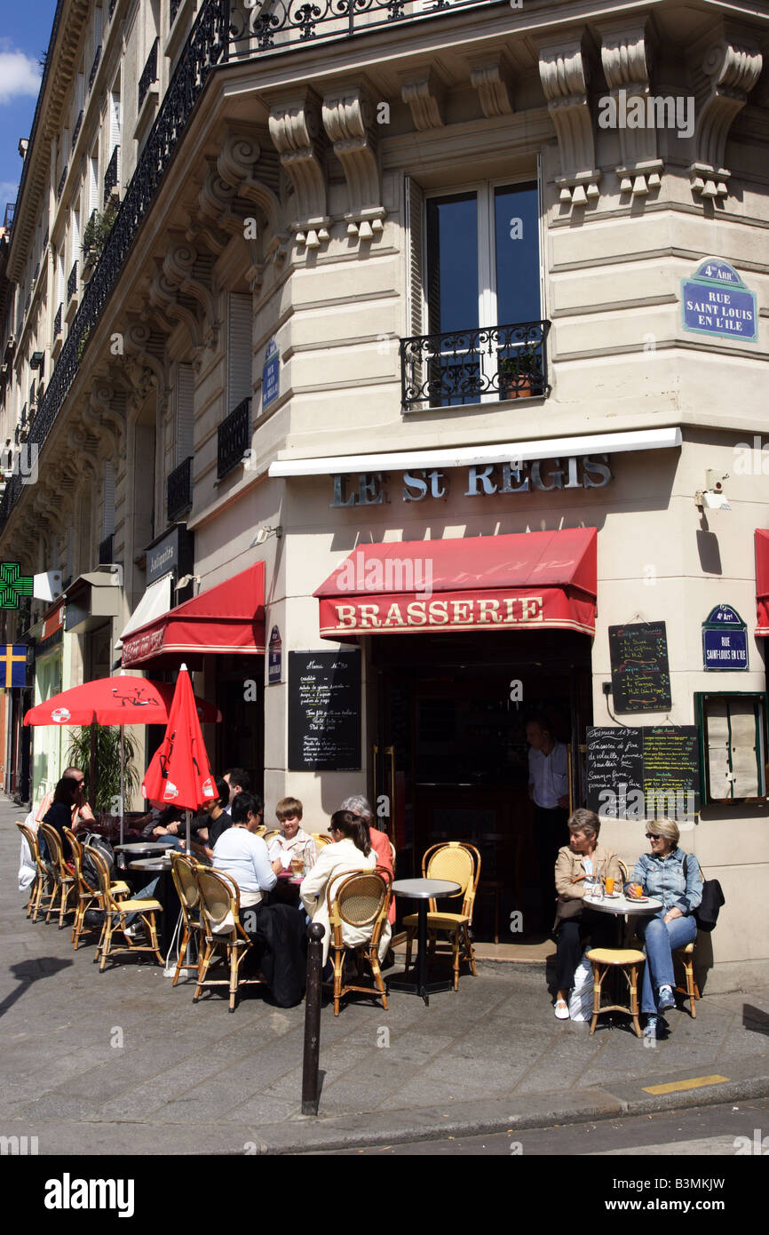 France Paris Enjoying the sights of Paris from a street cafe Stock ...