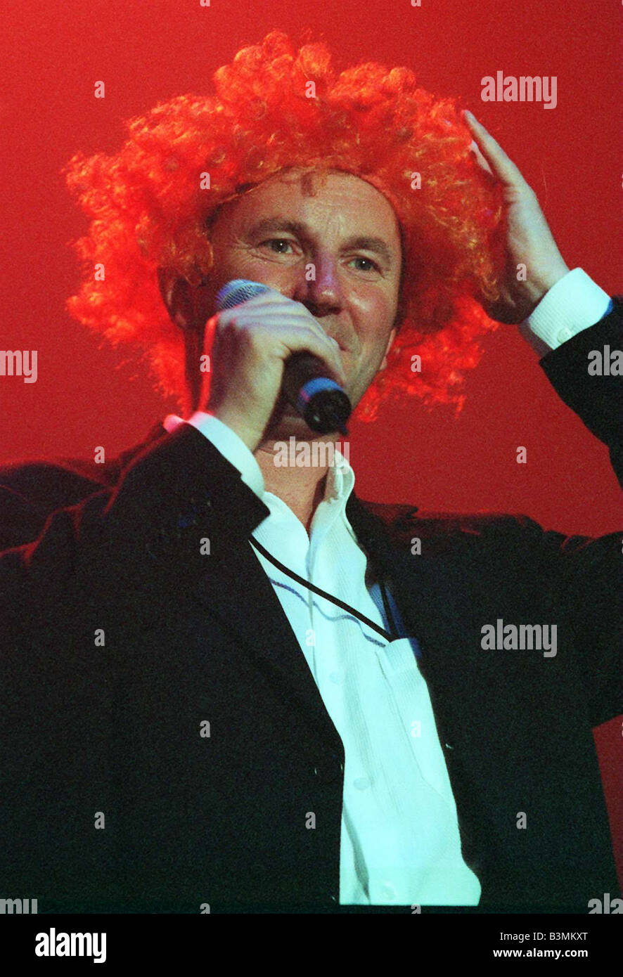 Fred MacAulay comedian wears orange curly wig May 1999 at the Scotland ...
