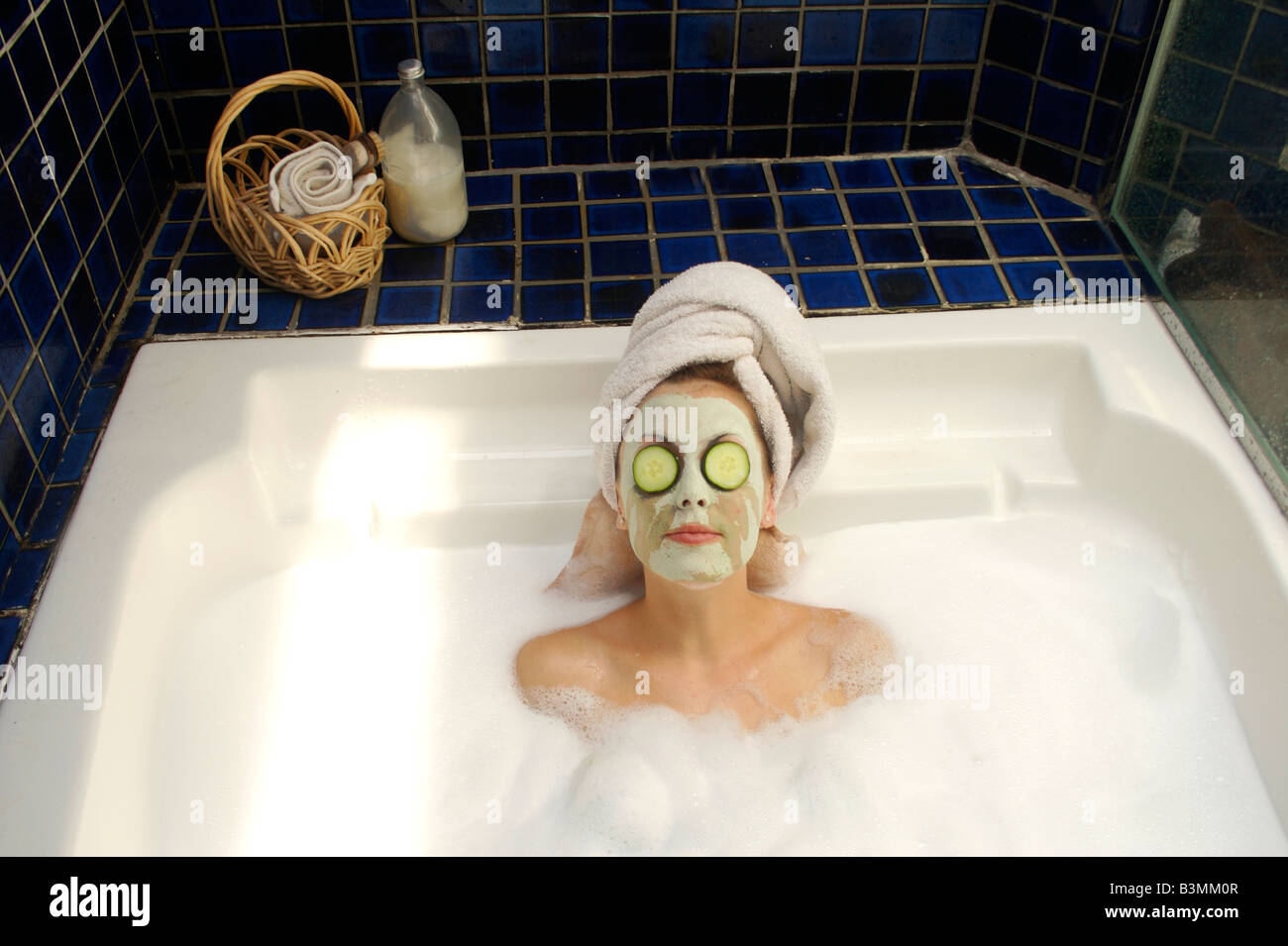 An attractive young lady relaxing in a bubble bath Stock Photo - Alamy
