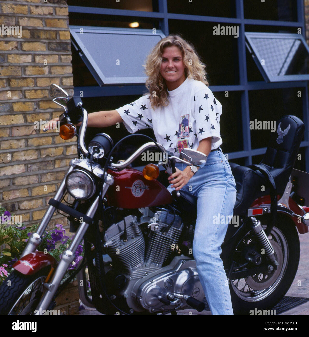 Andrea Boardman tv presenter December 1989 sitting on motorcycle Stock ...