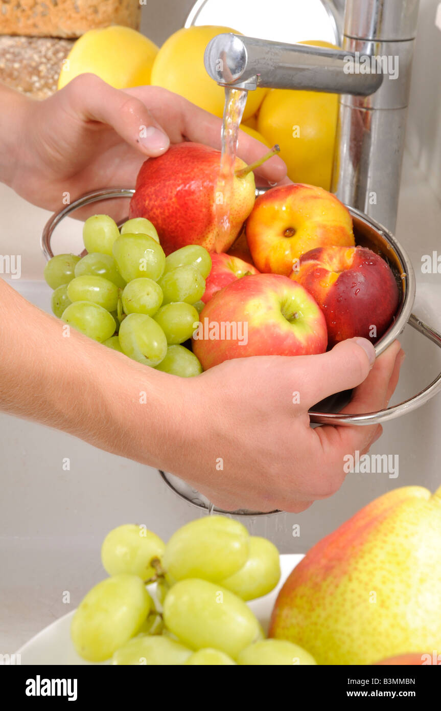 Washing fruit hi-res stock photography and images - Alamy
