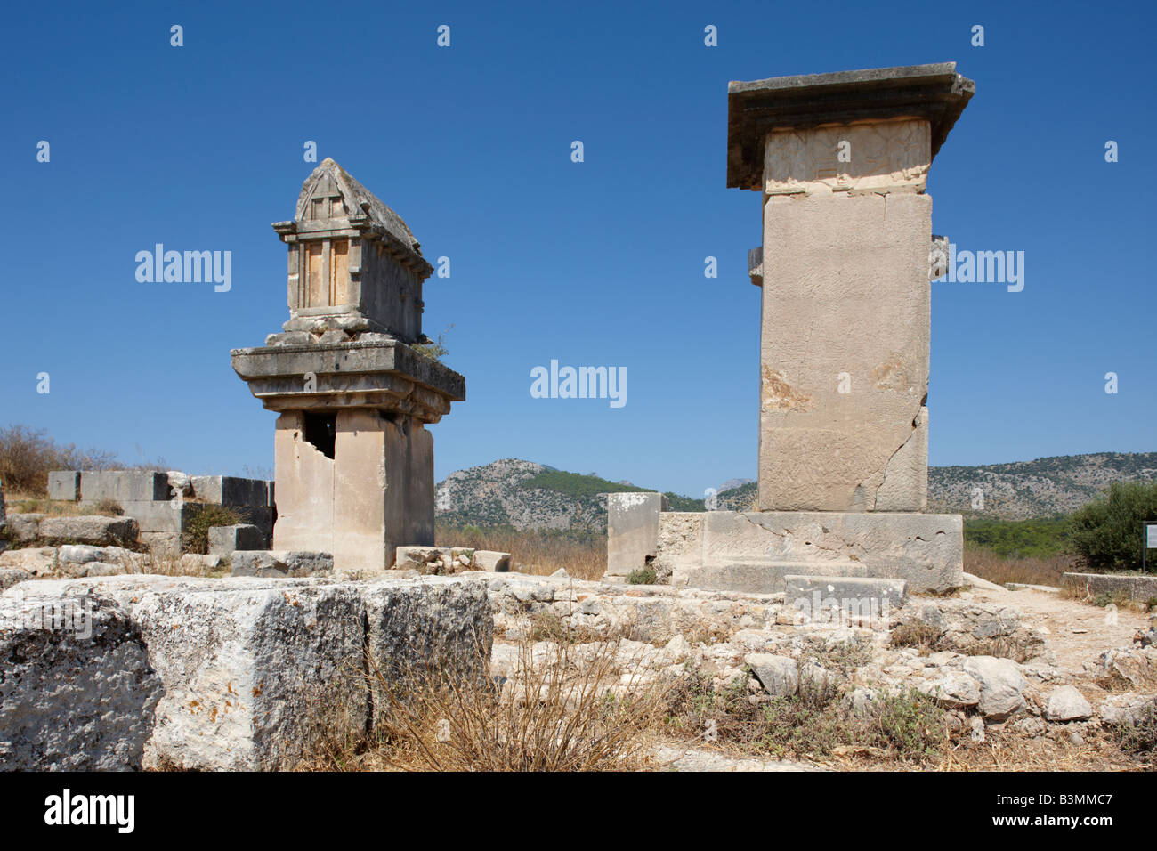 The Harpy Tomb (right) and Lycian Tower Tomb (left) in Xanthos, an ...