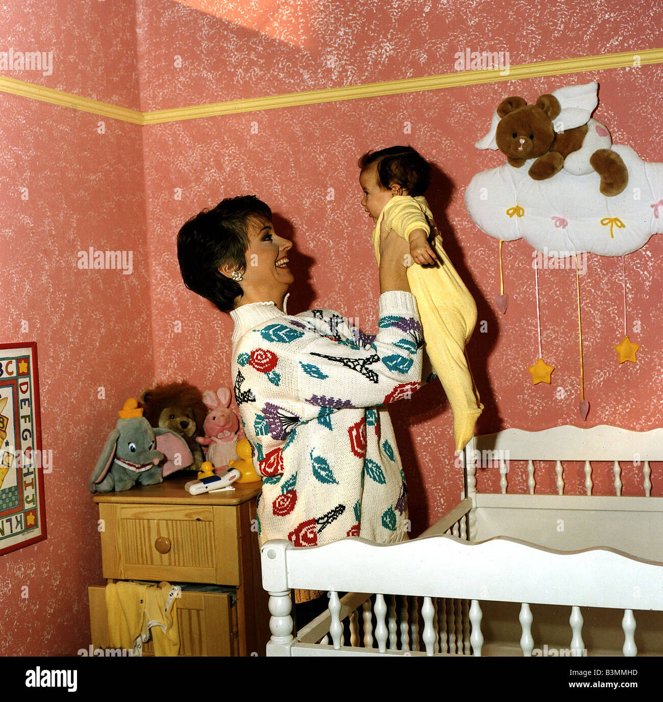 Anne Diamond cuddles tiny Clemency one of the babies used in the ad ...