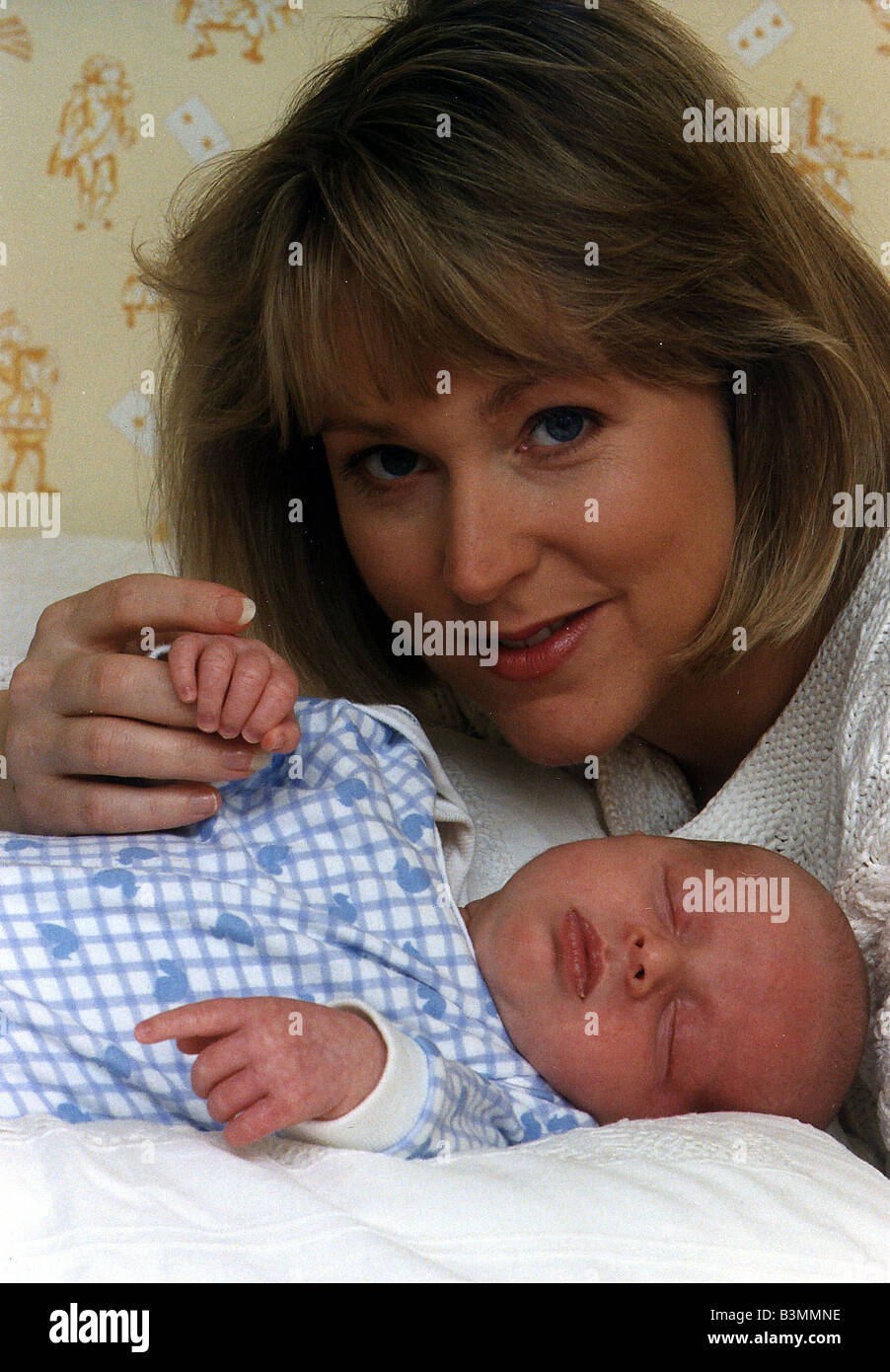 Kathryn Holloway TV Presenter of UK Livings Agony Programme with baby ...