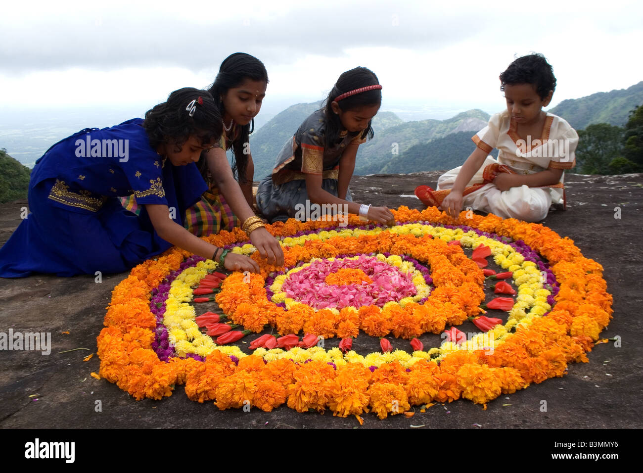 Children arranging floral carpet Stock Photo - Alamy
