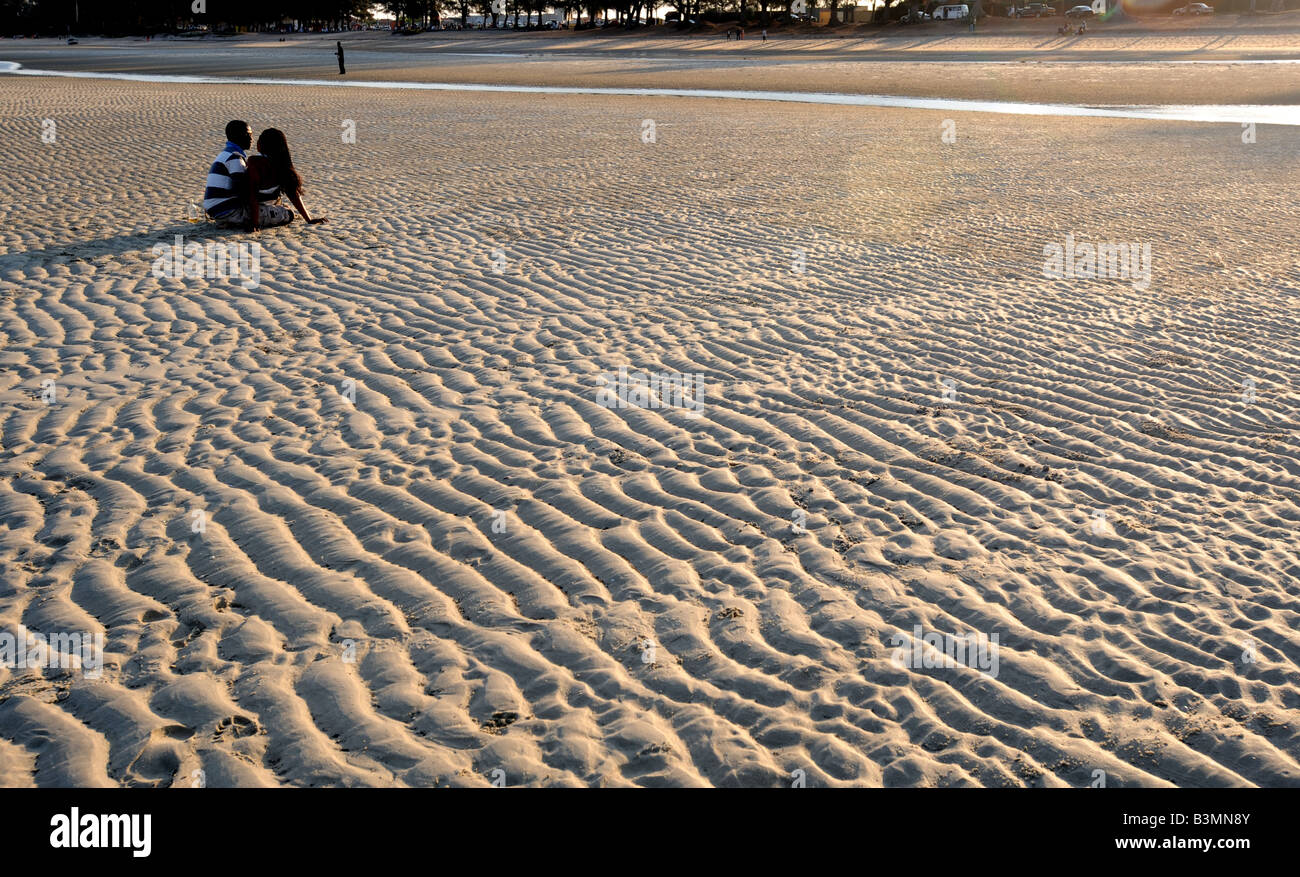 Couple on a beach in Maputo, Mozambique Stock Photo - Alamy