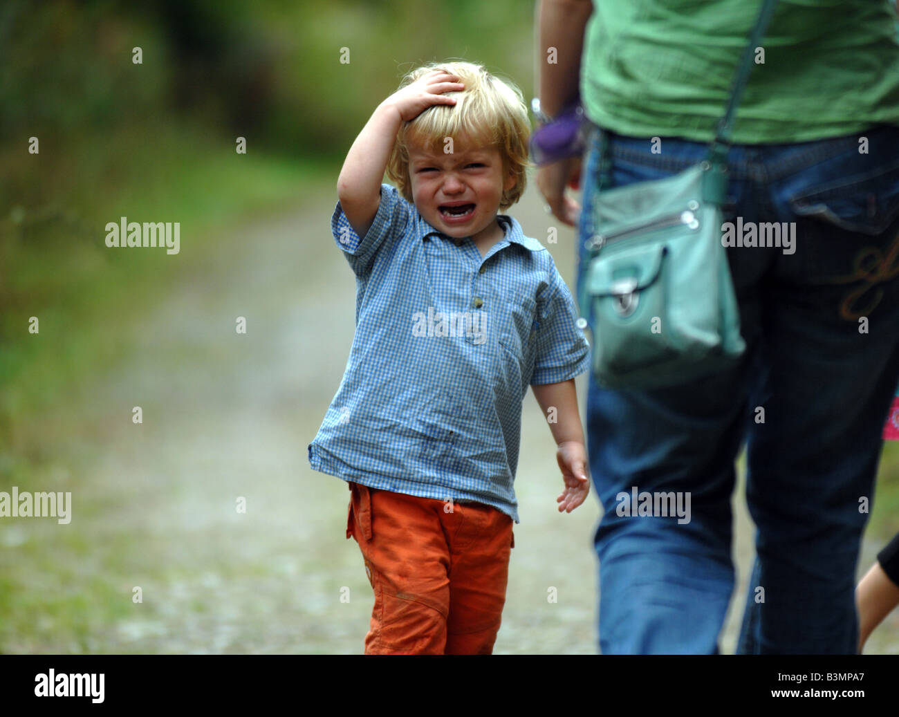 Tearful boy hi-res stock photography and images - Alamy