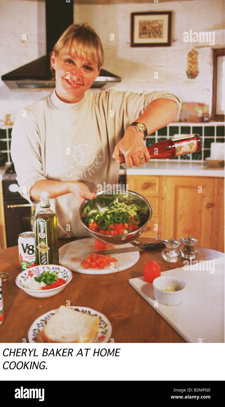 Cheryl Baker TV Presenter busy cooking in the kitchen of her house ...