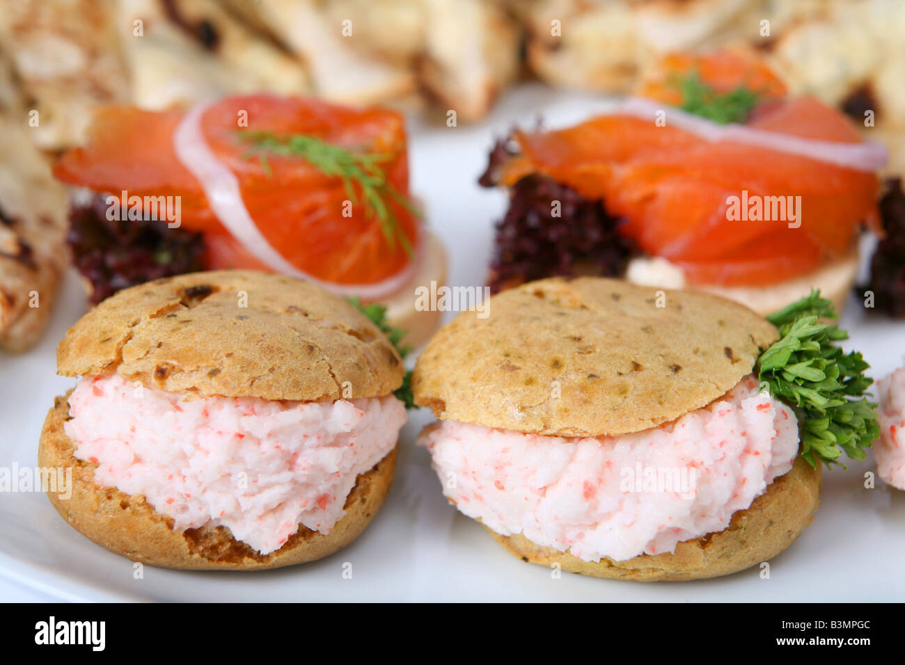 Canapes with a prawn meat filling on a tray with other delicacies Stock ...