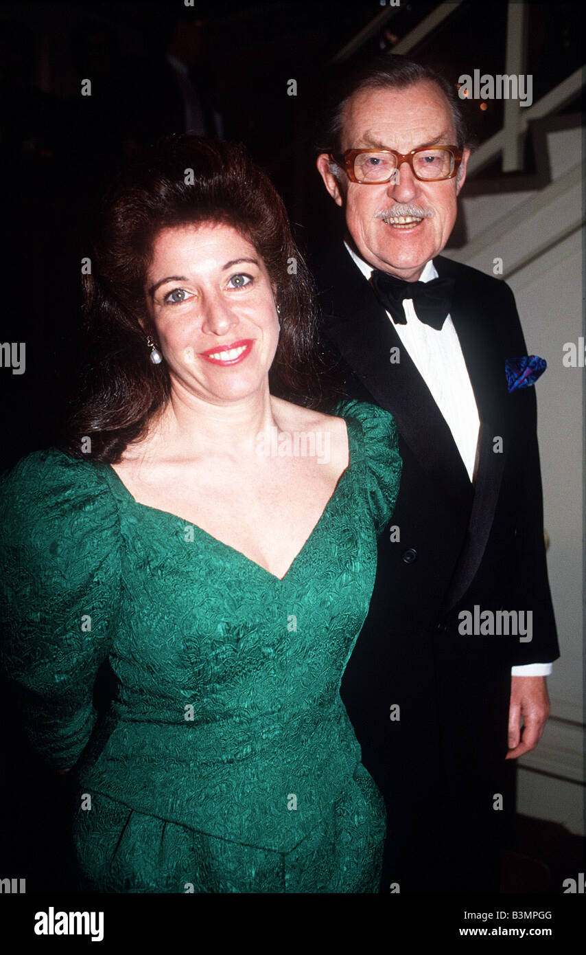Alan Whicker TV presenter with his wife at the BAFTA Awards Stock Photo ...
