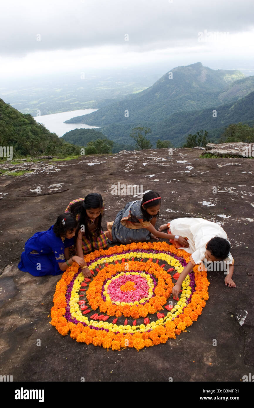 Children arranging floral carpet Stock Photo - Alamy