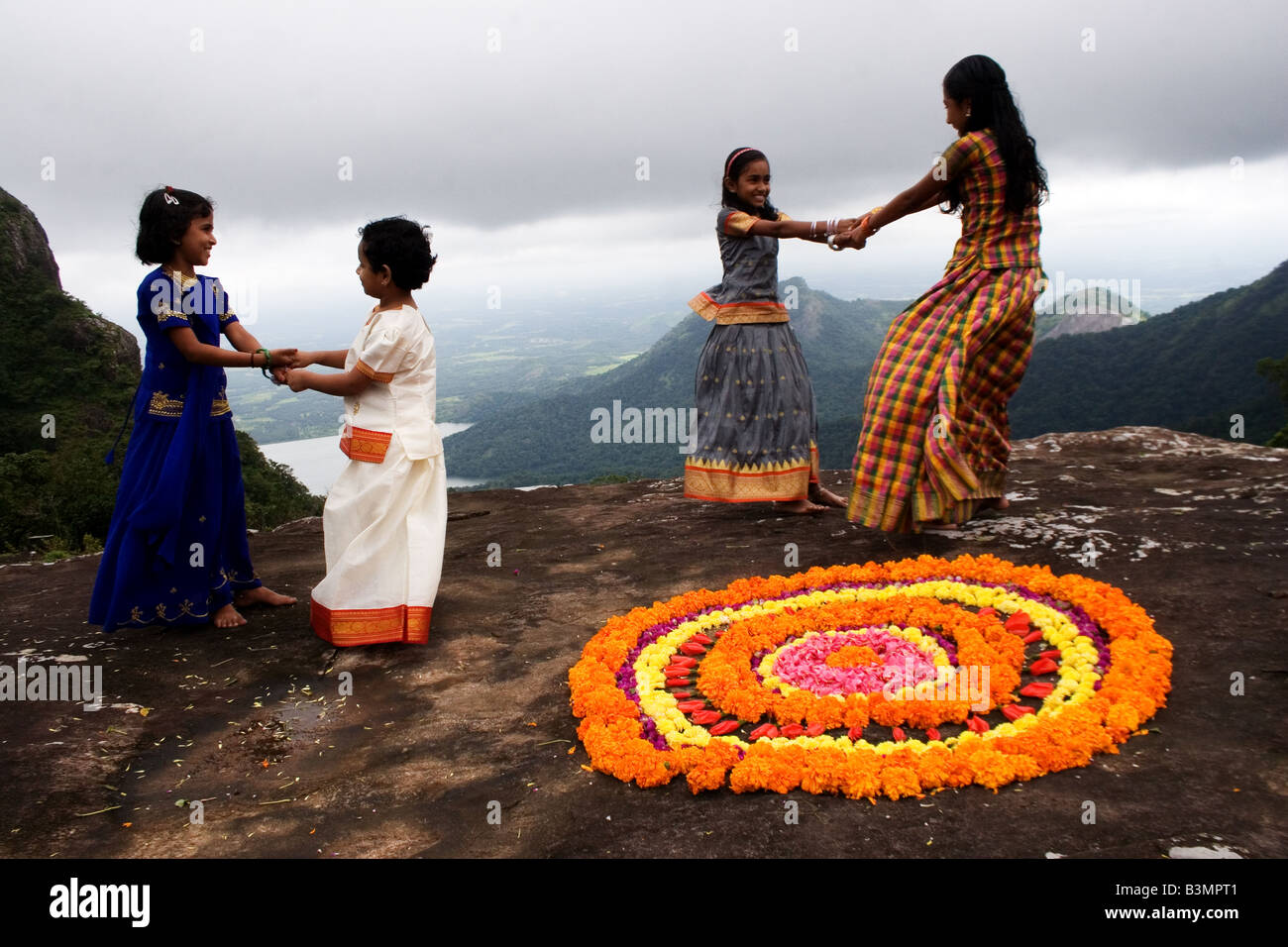 Children arranging floral carpet Stock Photo - Alamy