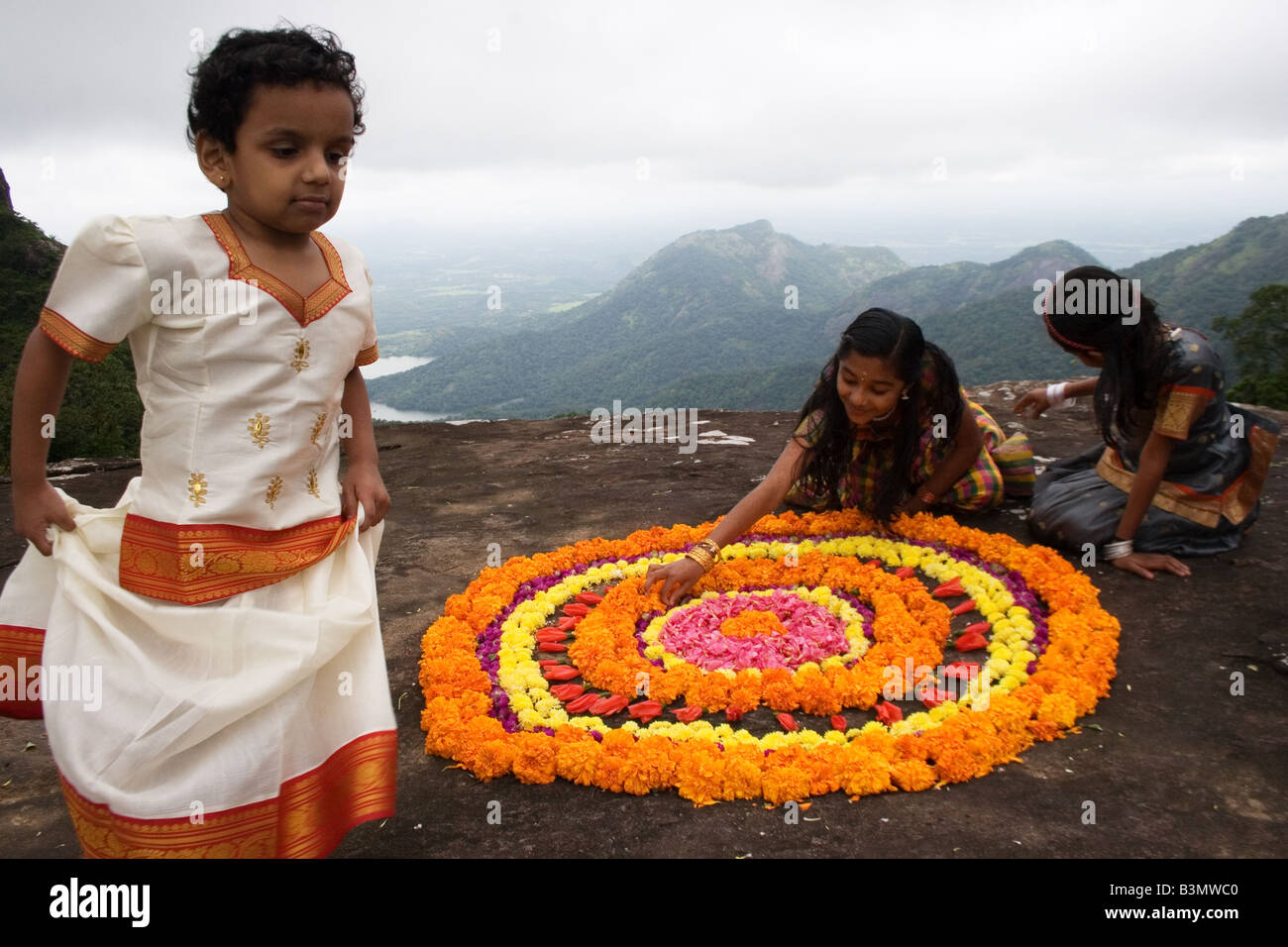 Children arranging floral carpet Stock Photo - Alamy
