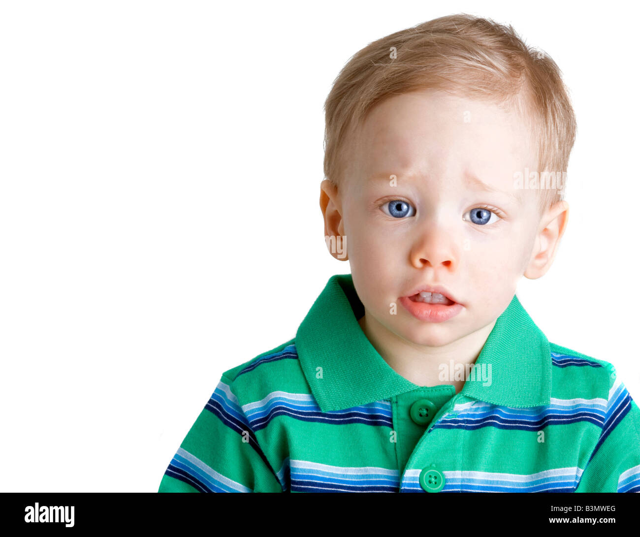 Young boy with a sad expression Stock Photo - Alamy
