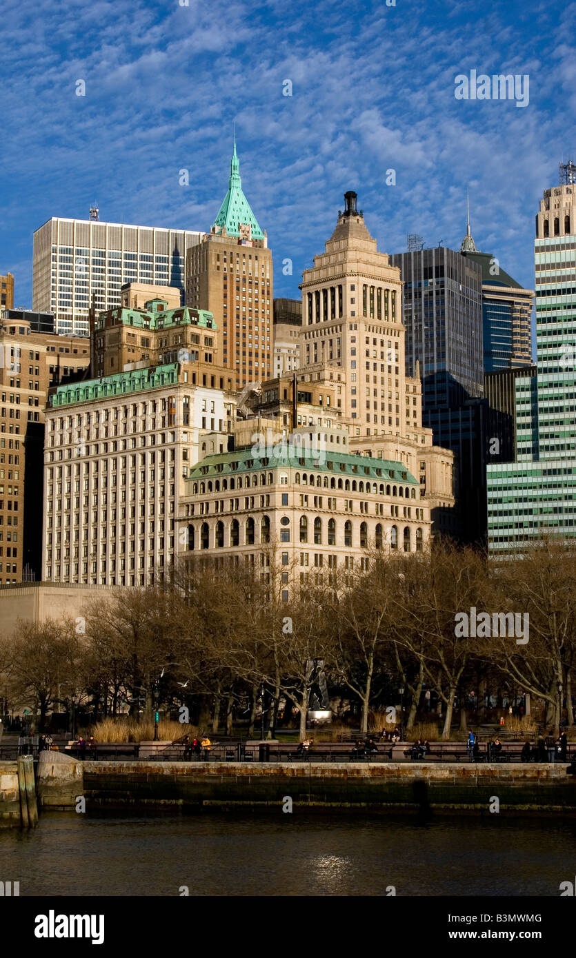 Manhattan classic skyscrapers behind Battery Park Stock Photo - Alamy