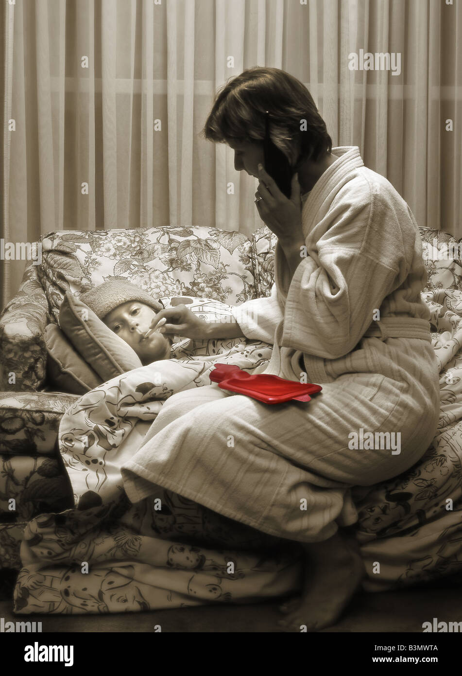 Sick child and mother Stock Photo - Alamy