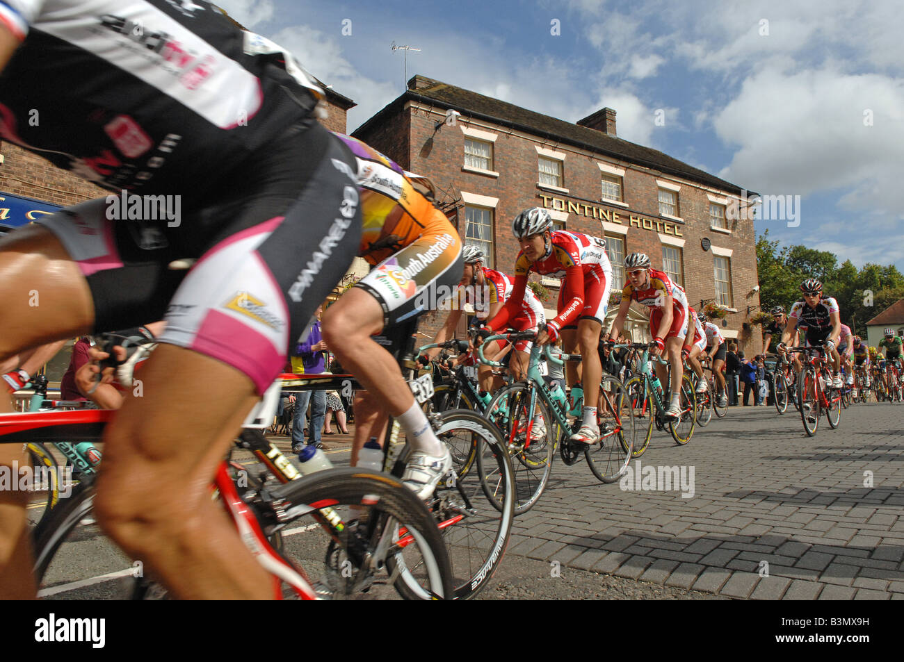 The Tour of Britain cycle race speeding through Ironbridge in Telford ...
