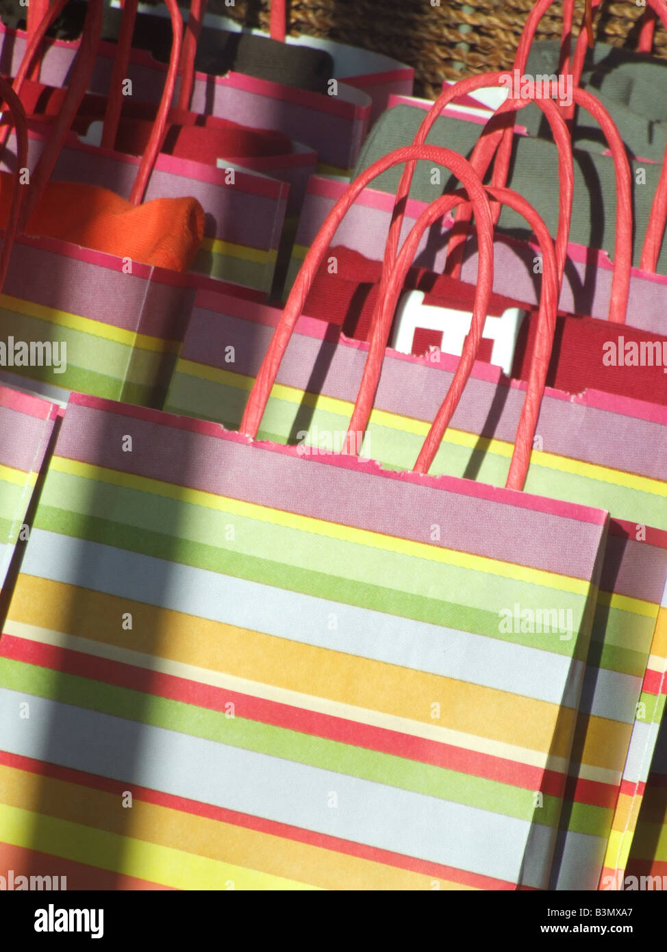 colourful customer paper bags in shop Stock Photo - Alamy