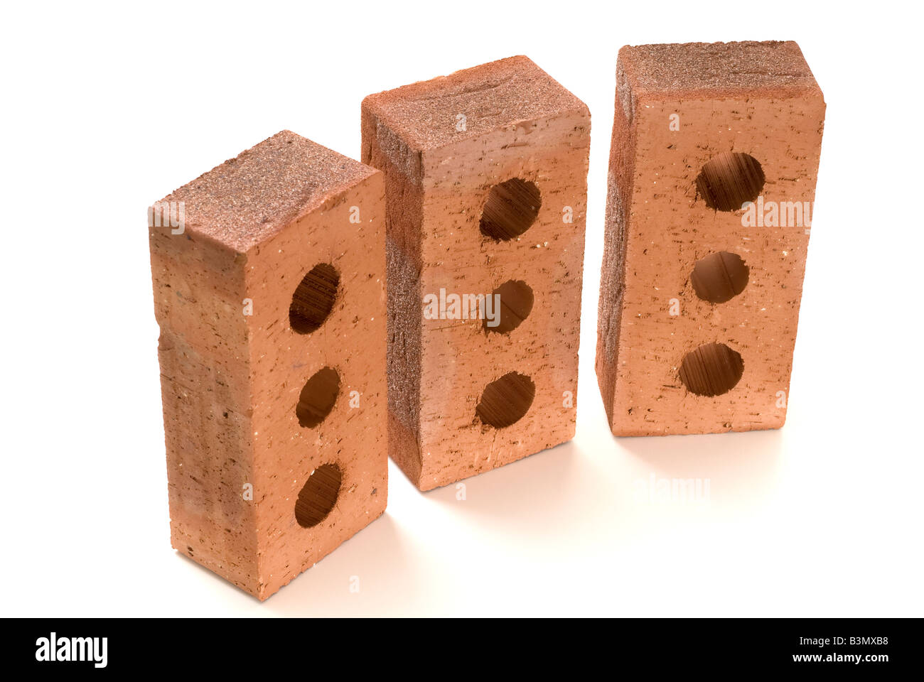 Three red facing bricks Stock Photo - Alamy