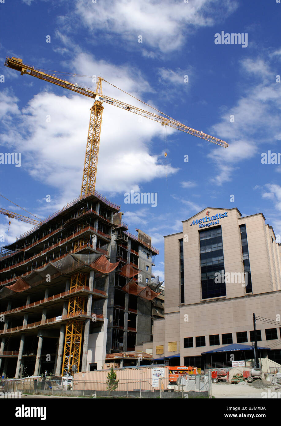 Large lifting cranes used for building construction Stock Photo - Alamy