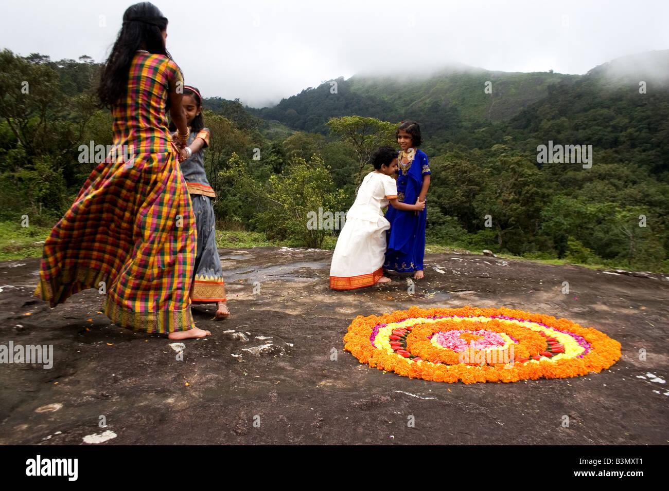 Children arranging floral carpet Stock Photo - Alamy