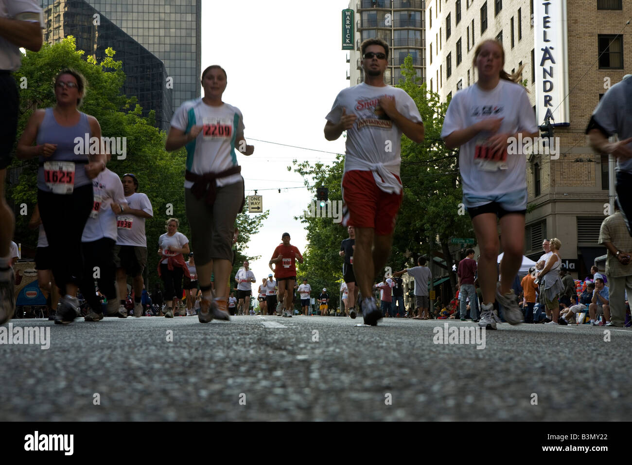 July 26, 2008. Runners approach a finish line of the The Torchlight Run ...