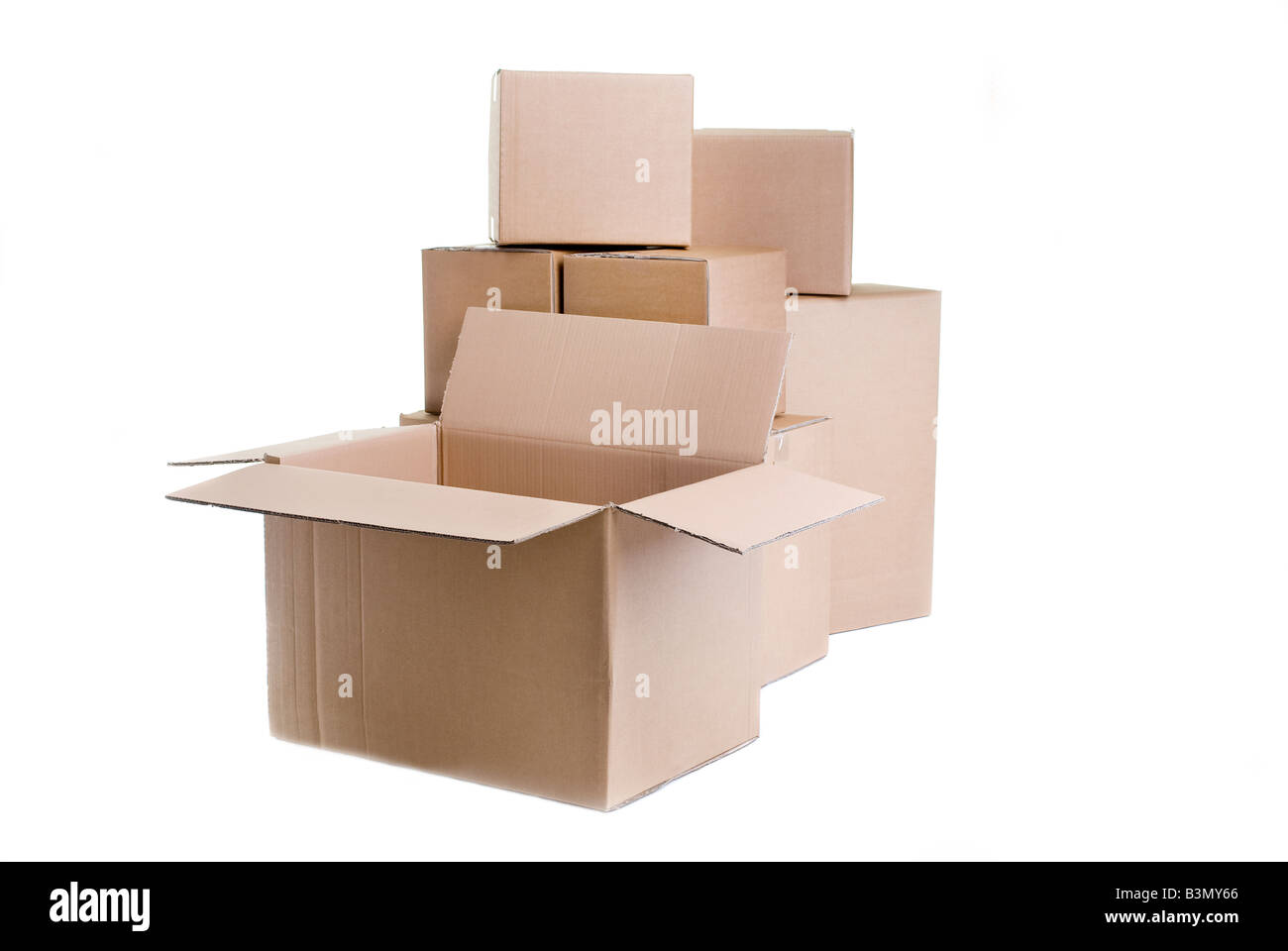 A pile of moving boxes with one open and ready to fill Stock Photo - Alamy