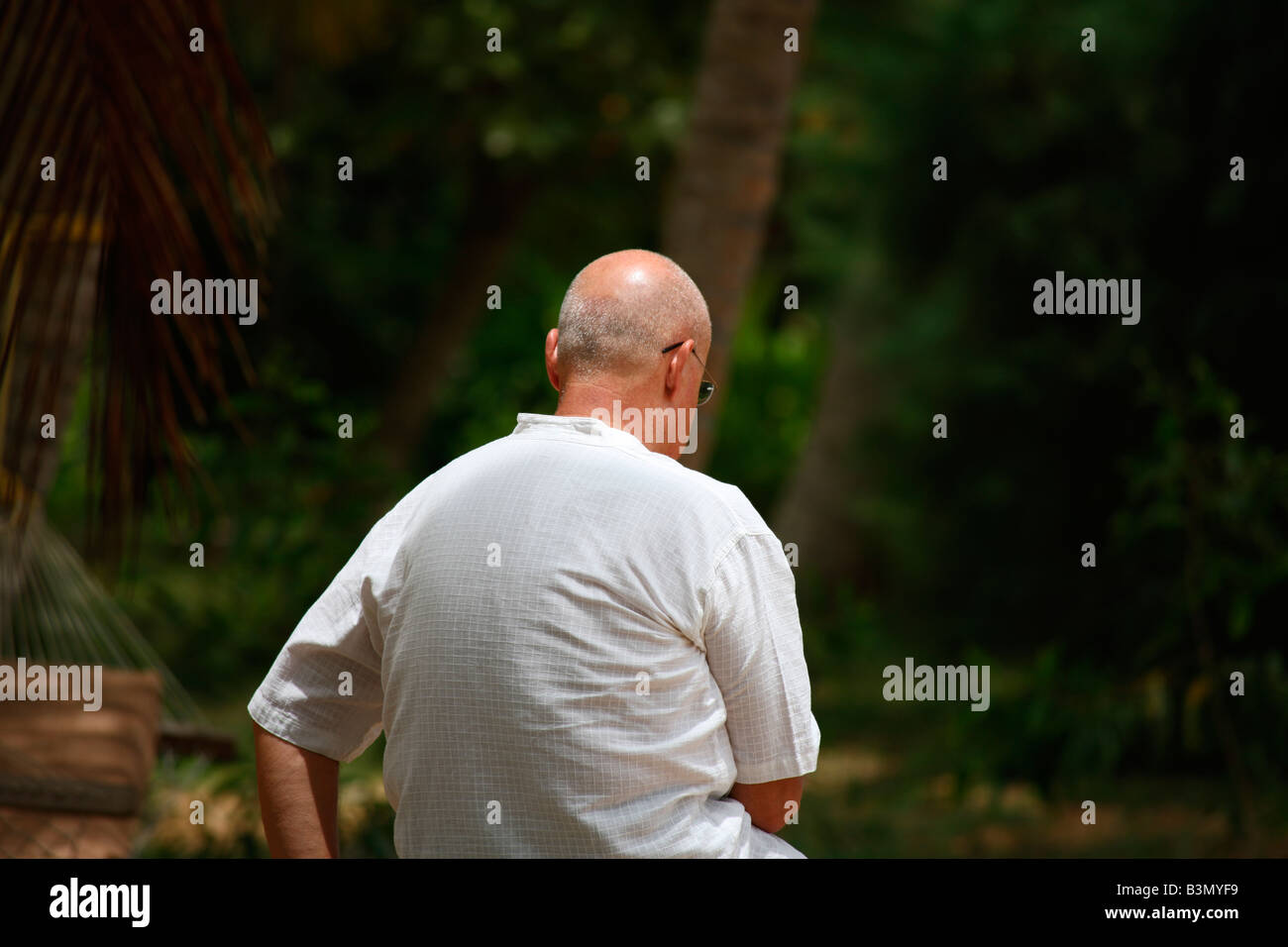 A man thinking in a garden Stock Photo - Alamy