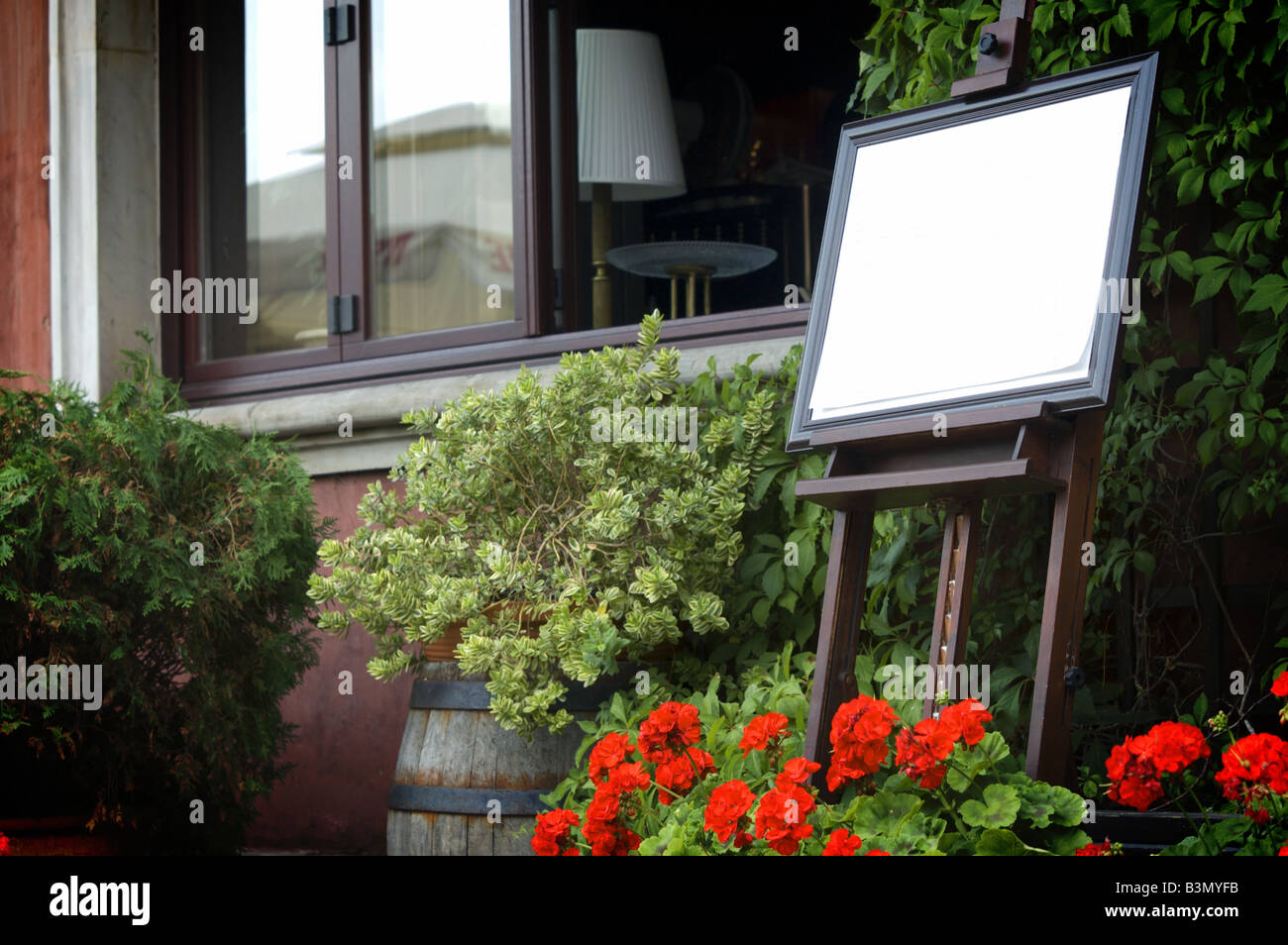 Restaurant and menu board standing outside Stock Photo - Alamy