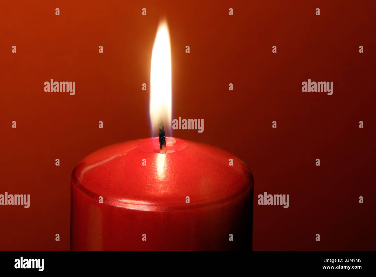 Lit candle, close up Stock Photo - Alamy