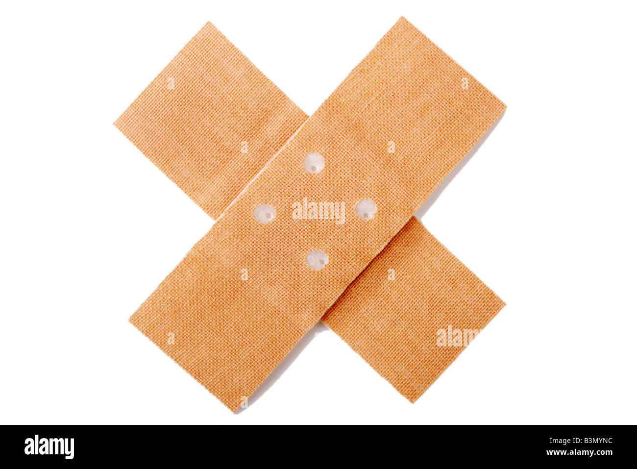 Cross adhesive bandages, close-up Stock Photo - Alamy