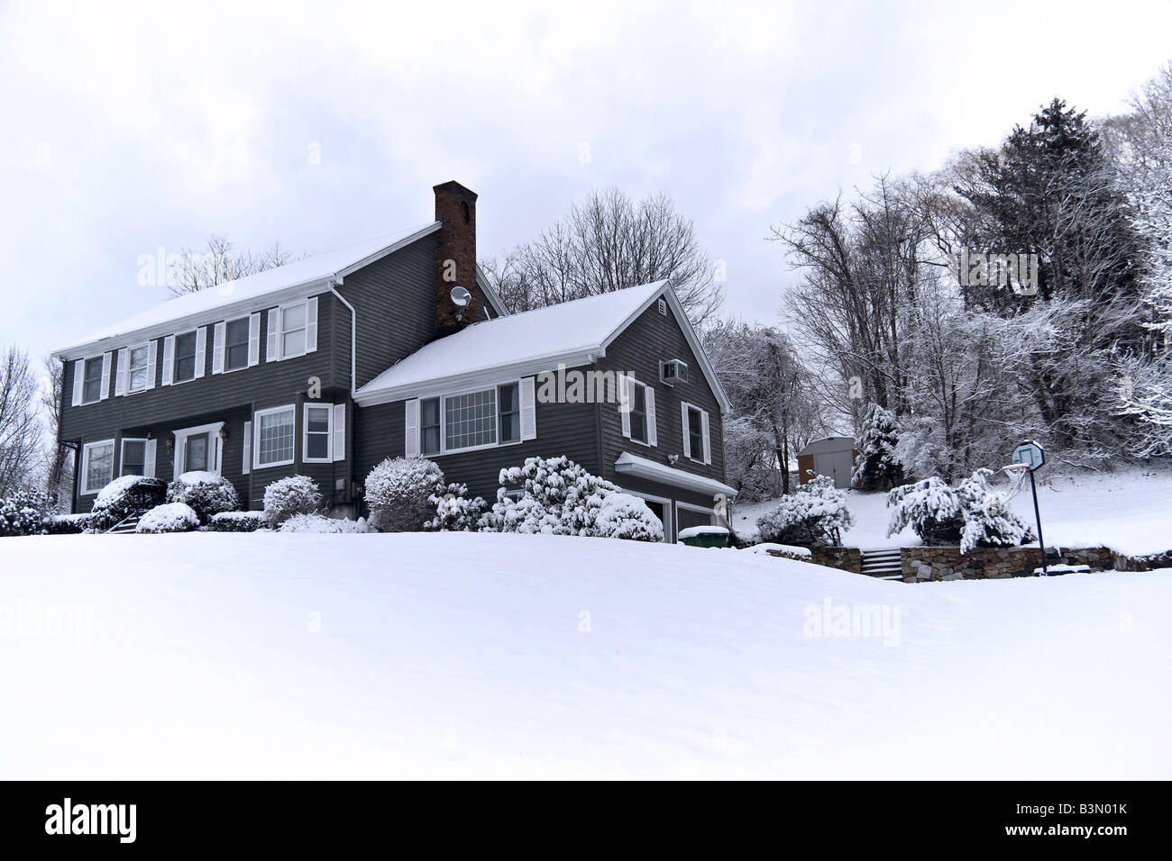 Traditional American colonial style house in winter Stock Photo - Alamy