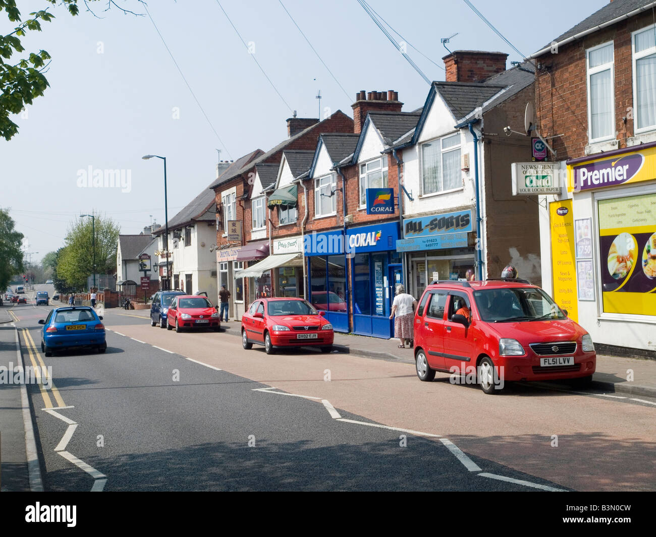 A row of shops and the main road through Forest Town in Mansfield ...