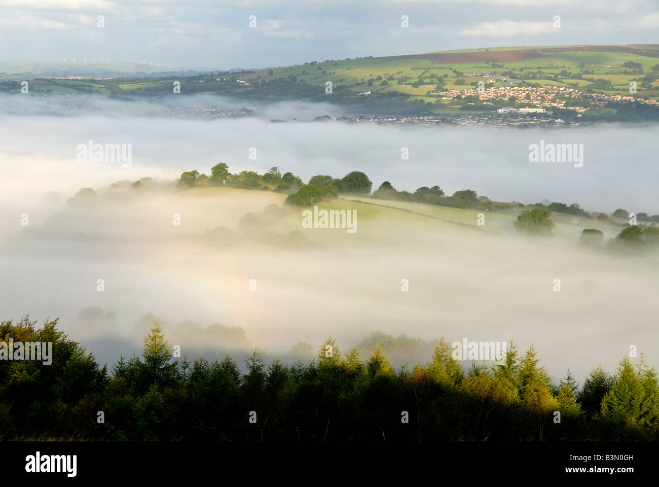 Temperature inversion over Caerphilly at dawn Stock Photo - Alamy