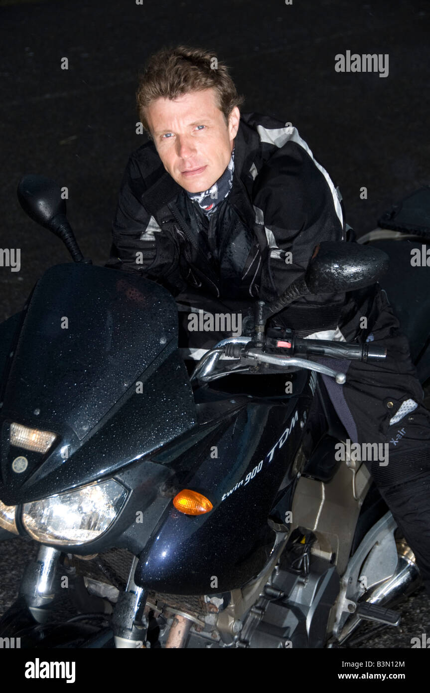 Man motorbike motorcycle Model released Stock Photo - Alamy