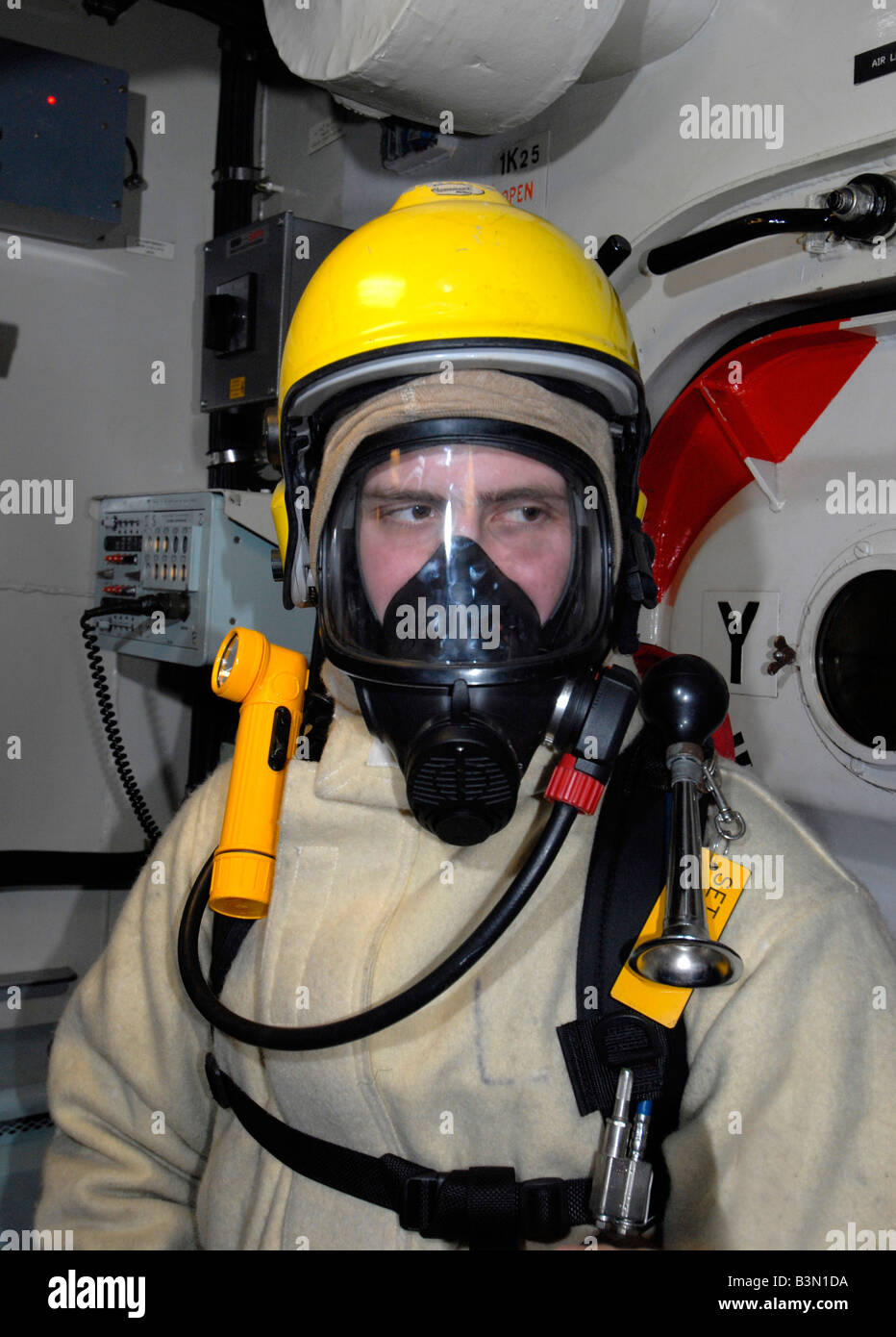 Firefighting team member with full fire proof suit Type 23 Duke Class ...