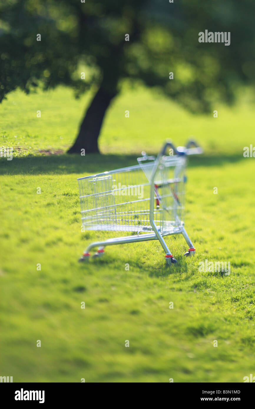 shopping trolley in a field Stock Photo - Alamy