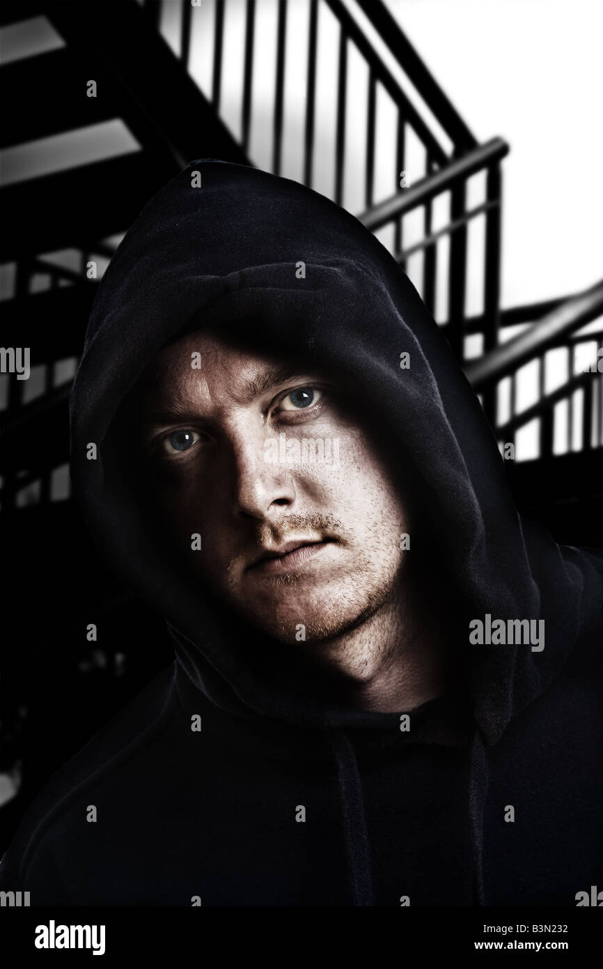 Shot of an Intimidating Male in Hooded Top (Hoody) in an Urban Setting ...