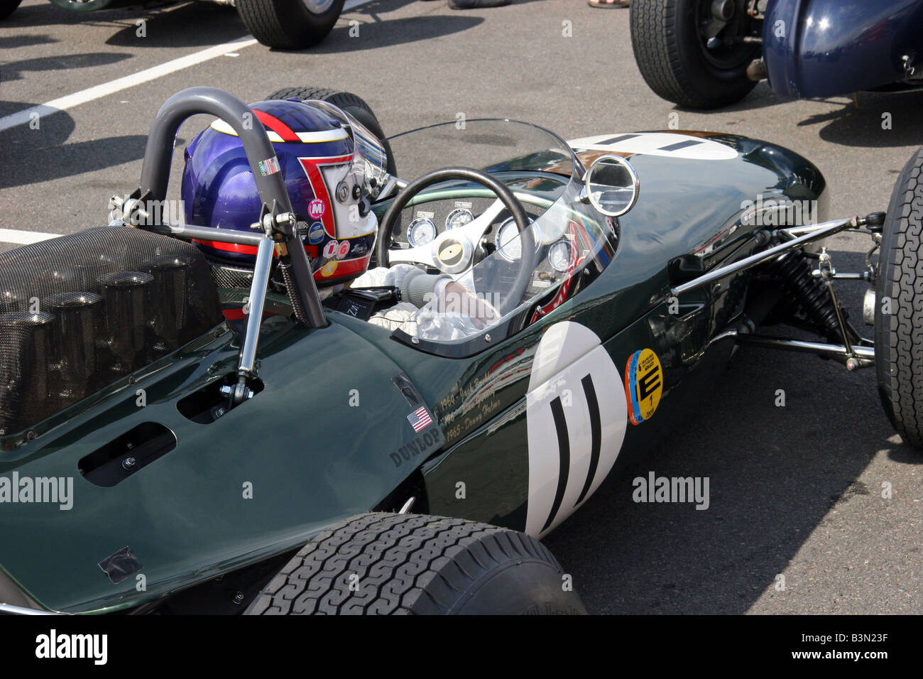 green racing car on in the pit at start of race Stock Photo - Alamy