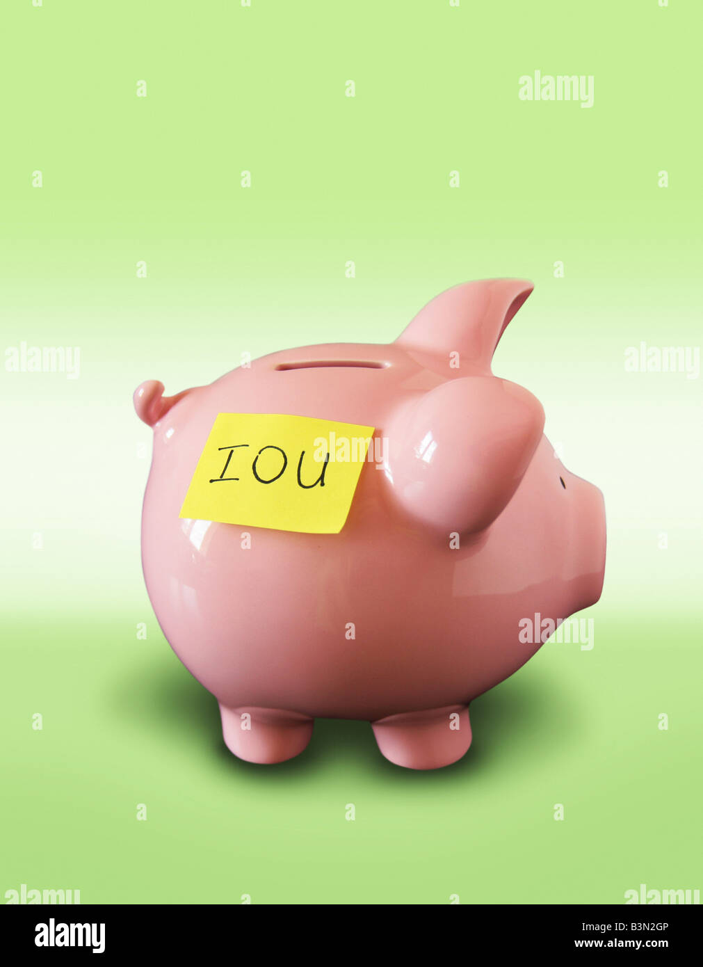 piggybank with IOU label Stock Photo - Alamy