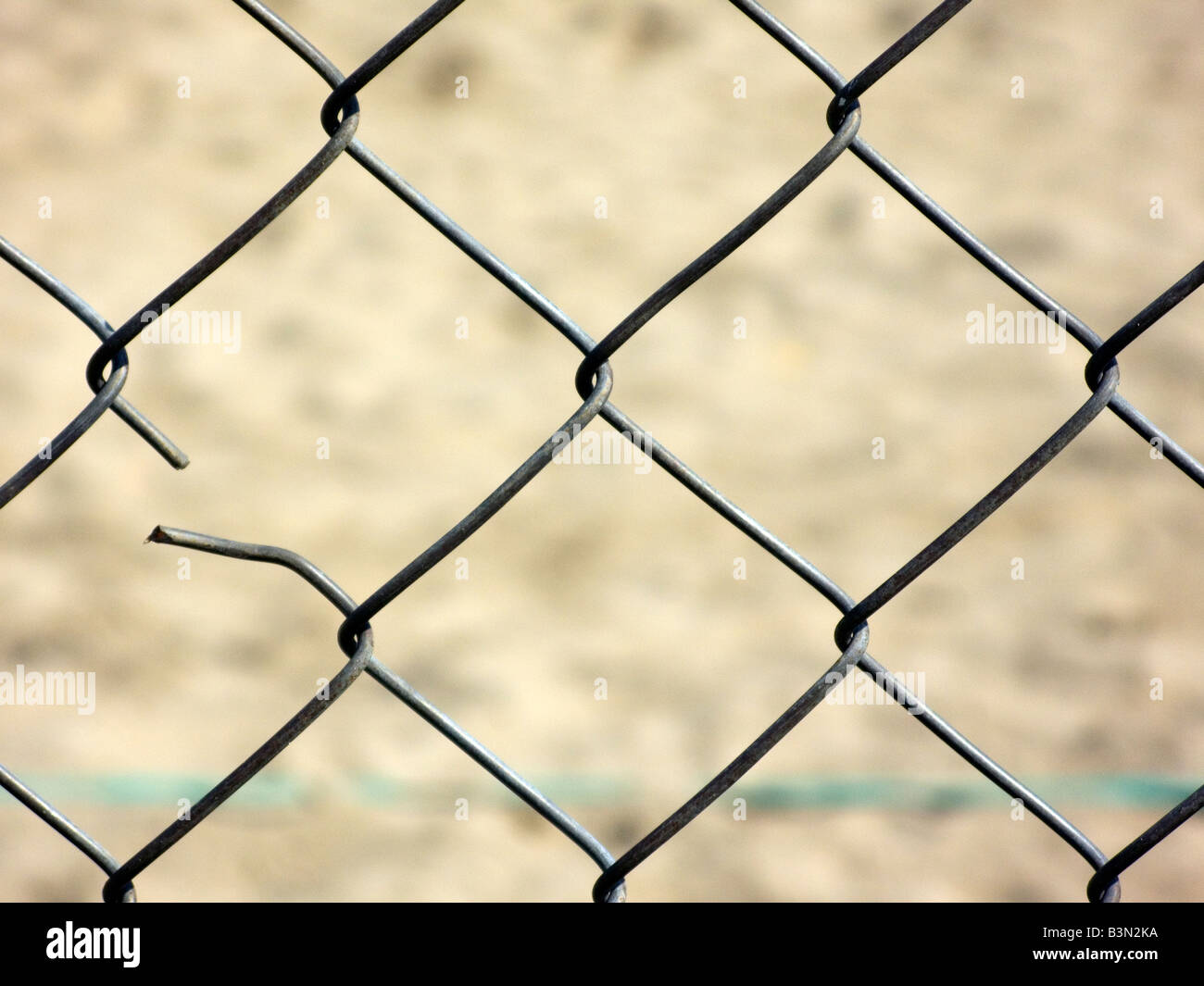 Broken metallic wire hedge Stock Photo - Alamy