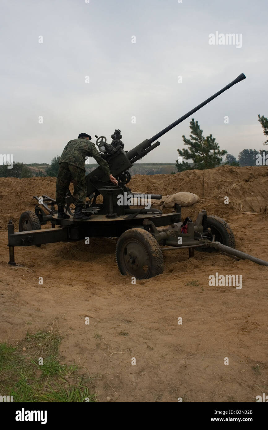 Scene from World War 2 Soldier operating canon Stock Photo - Alamy