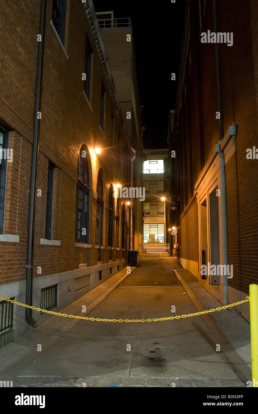 Photograph of an alley way at night Stock Photo - Alamy