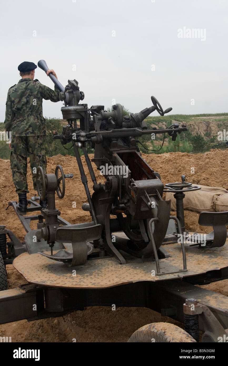Scene from World War 2 Canon and its operator Stock Photo - Alamy