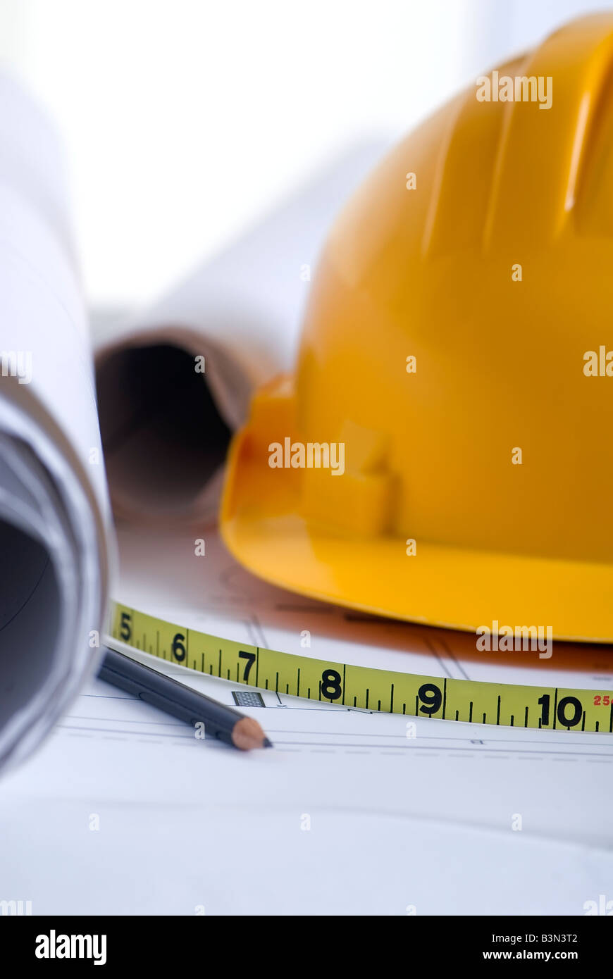 An engineer s work table with drawings and tools of the trade Stock ...