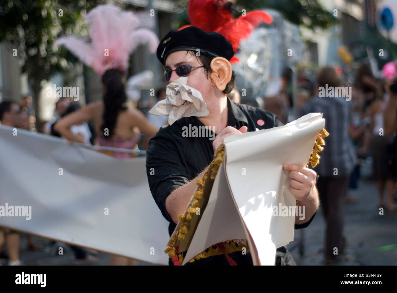 An artist eats his work in the art parade, SoHo, New York Stock Photo ...