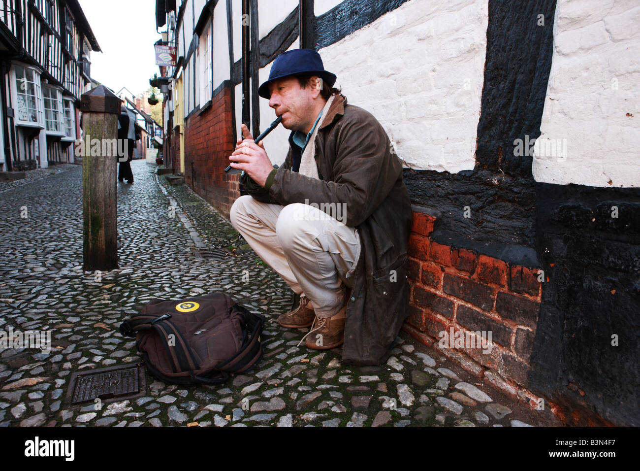 Homeless Man Busking High Resolution Stock Photography and Images - Alamy