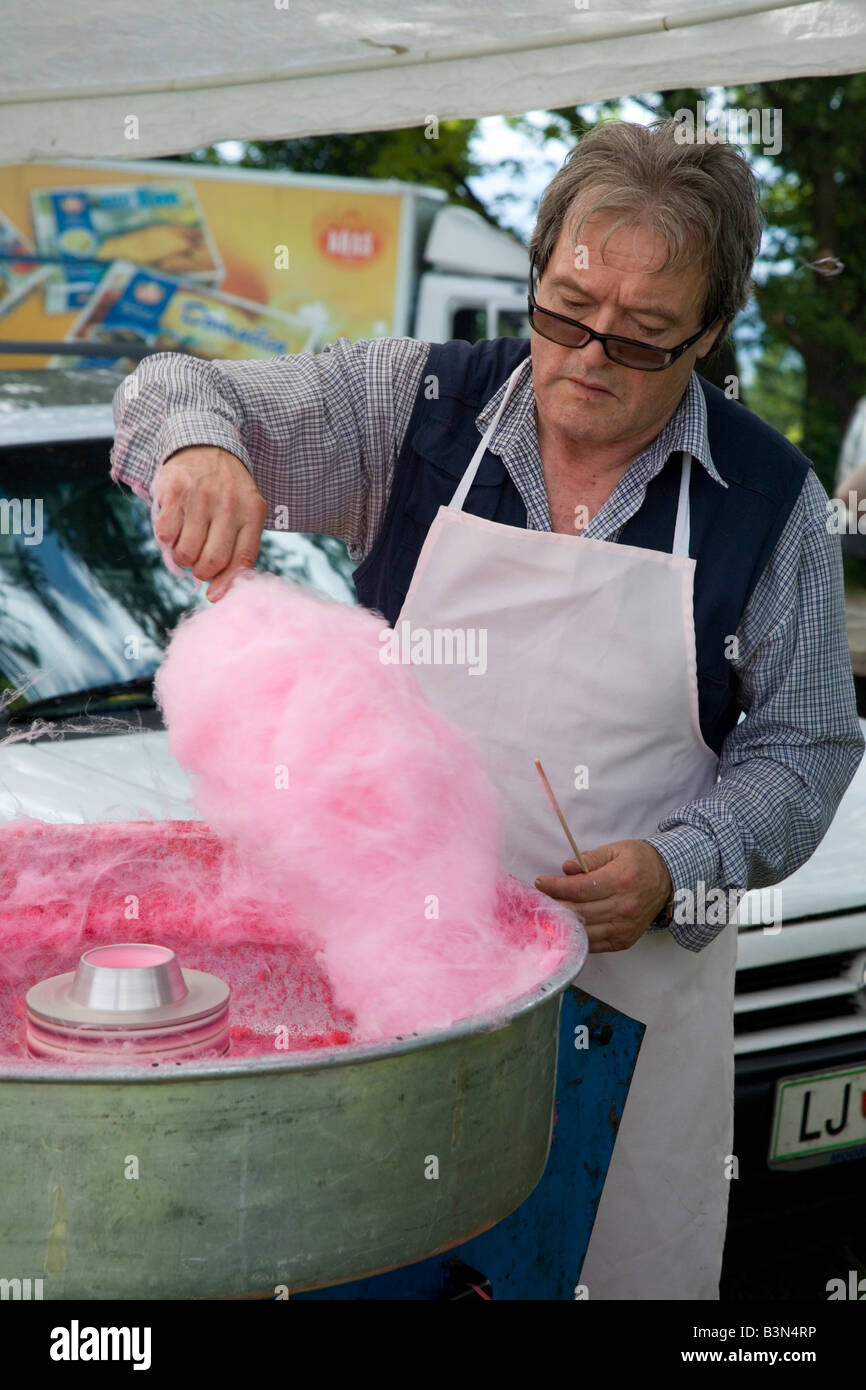 Local man making candy floss at the Strawberry Sunday Festival on Jance ...