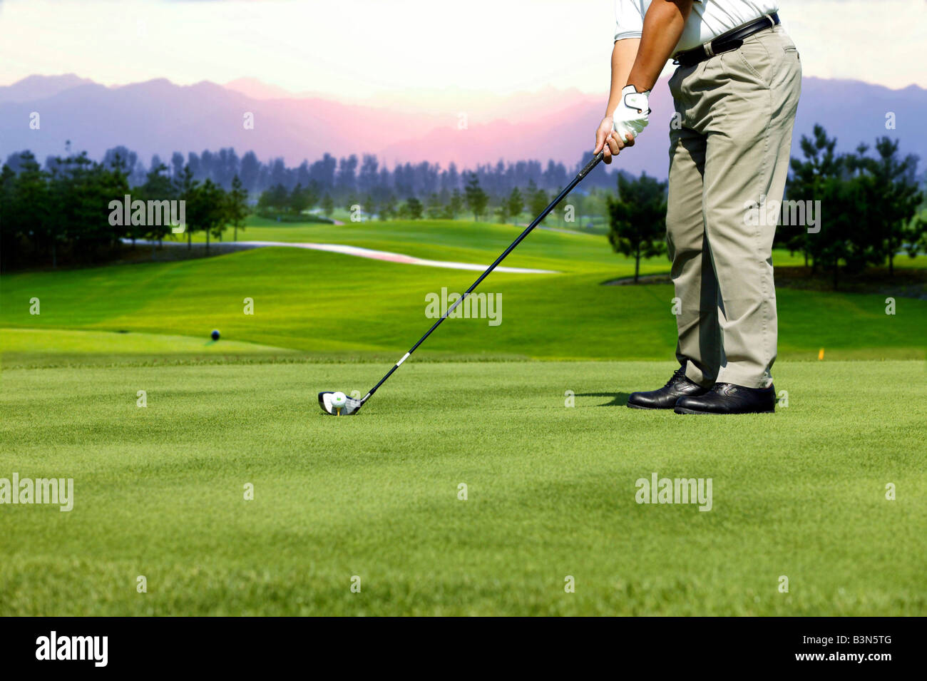 Chinese Man Playing Golf Stock Photo - Alamy